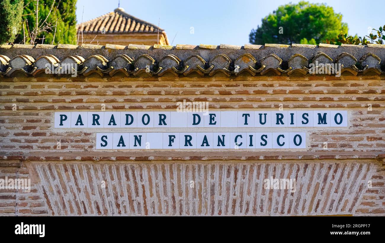 Alhambra, Spain, Sign on top of a gate with an brick wall. It reads San ...