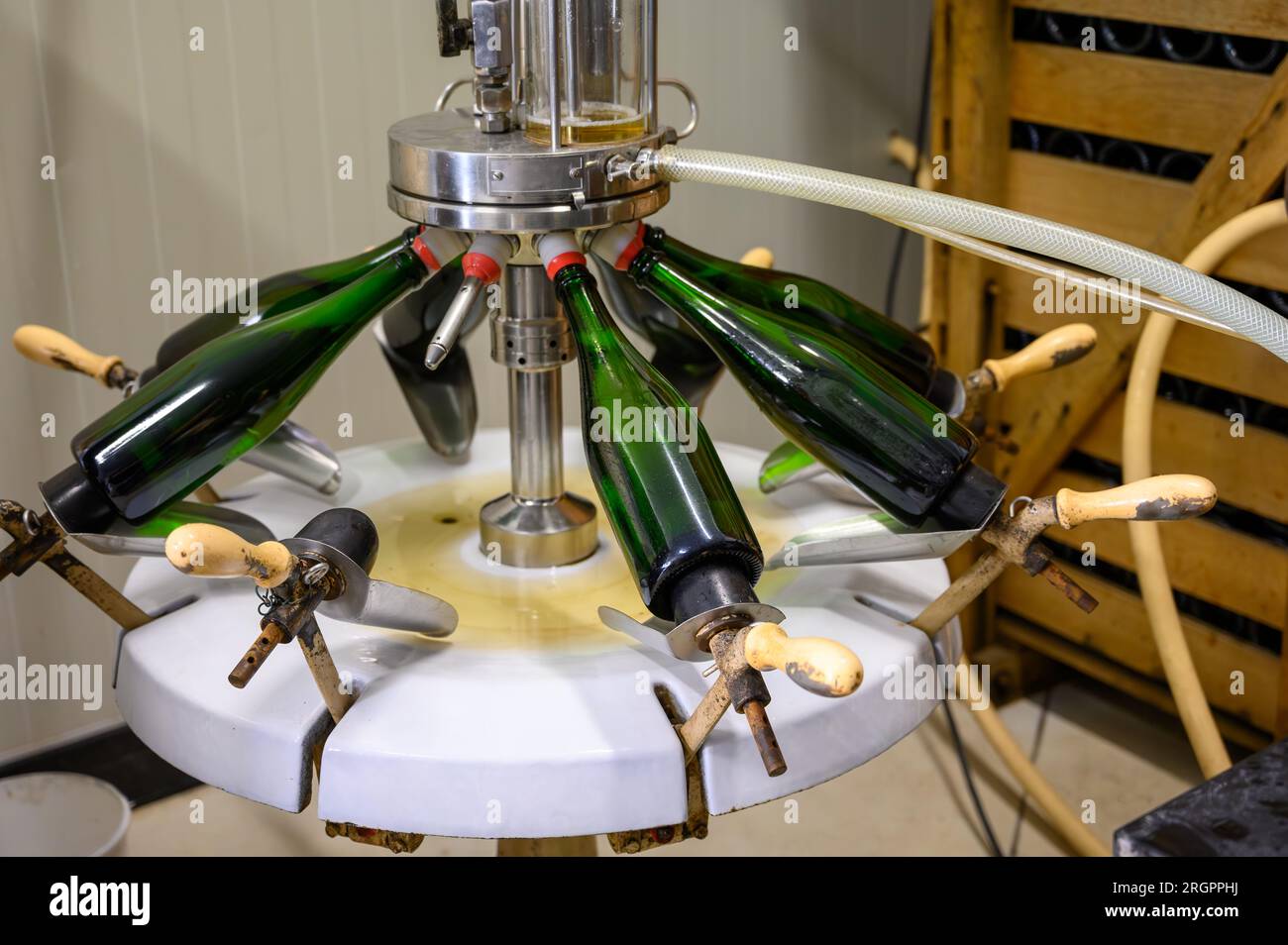 Disgorgement and adding sweet liquor procedure, traditional way of ...