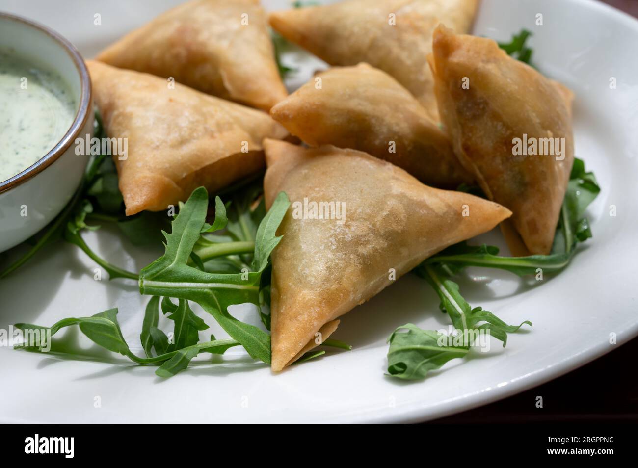 Traditional Middle East snack fried stuffed samosa pies with vegetables ...