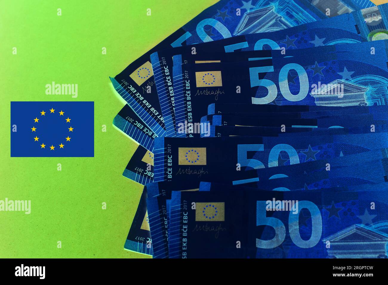 Blue banknotes with the green background Stock Photo - Alamy