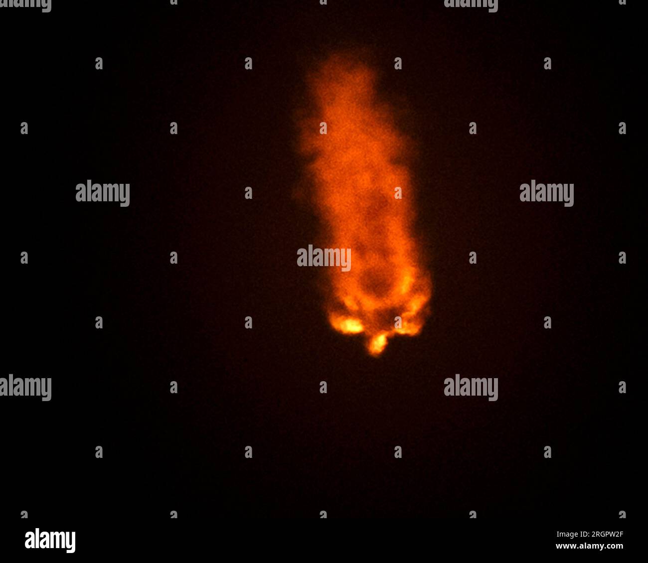 The exhaust plume of a SpaceX Falcon 9 rocket changes color just prior ...