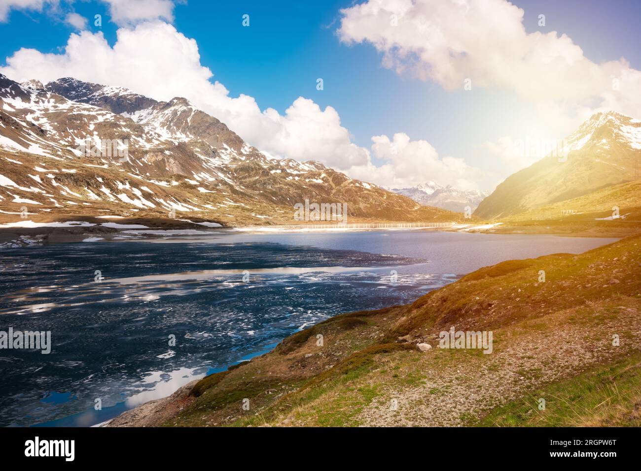 Lake in Switzerland in spring with some ice, alps landscape Stock Photo ...