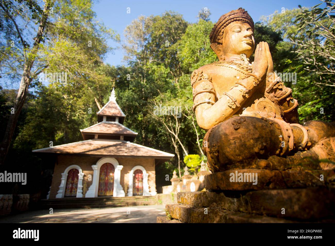 Wat Phra Lat in Chiang Mai. Temple of a Buddhist monastery with statues ...