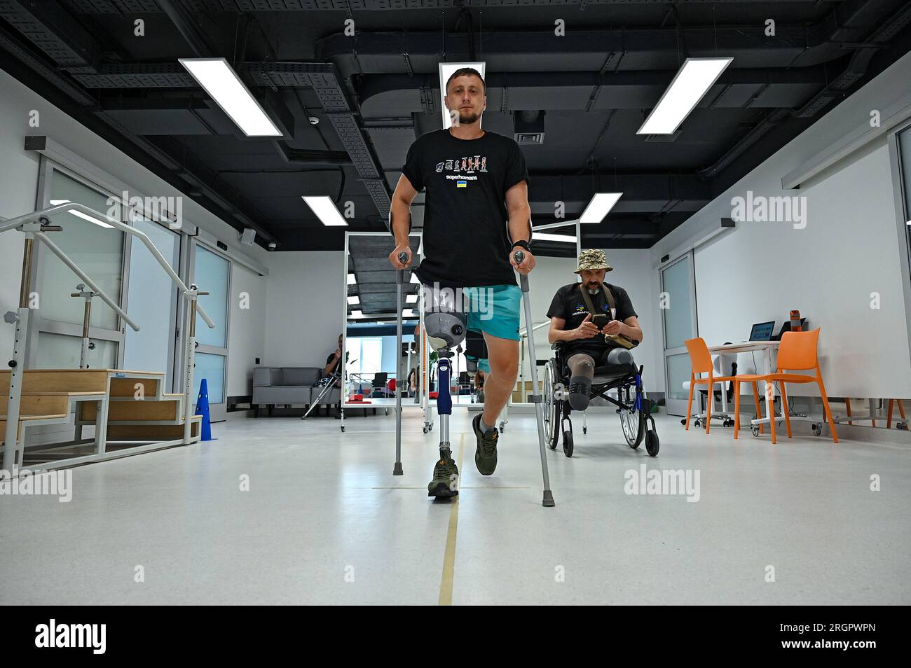 VYNNYKY, UKRAINE - AUGUST 9, 2023 - Patient Kostiantyn exercises at the ...