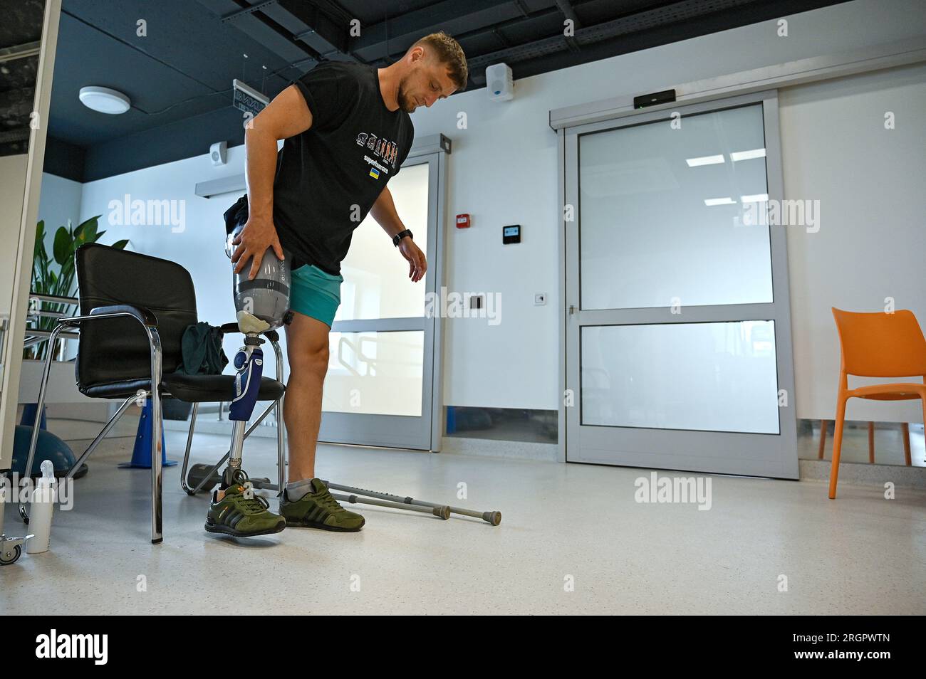 VYNNYKY, UKRAINE - AUGUST 9, 2023 - Patient Kostiantyn exercises at the ...