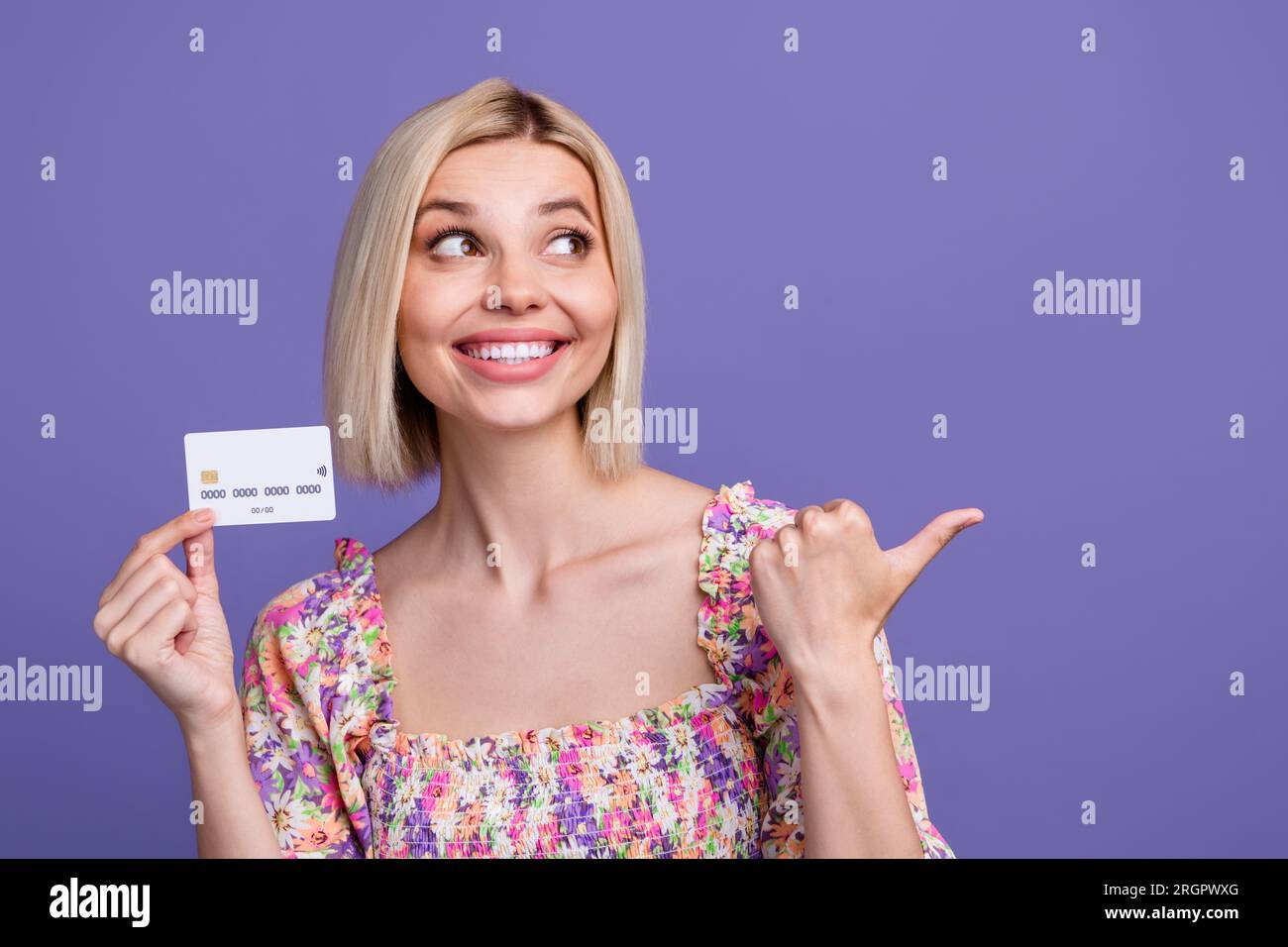 Portrait of pretty lovely person toothy smile hand hold debit card look ...