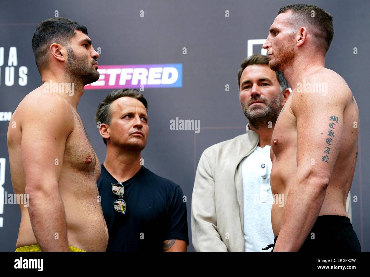 Filip Hrgovic (left) and Demsey McKean face off during the public weigh ...