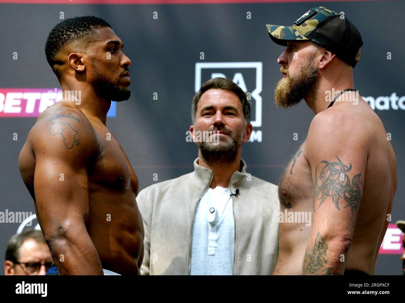 Matchroom Sport chairman and boxing promoter Eddie Hearn (centre ...