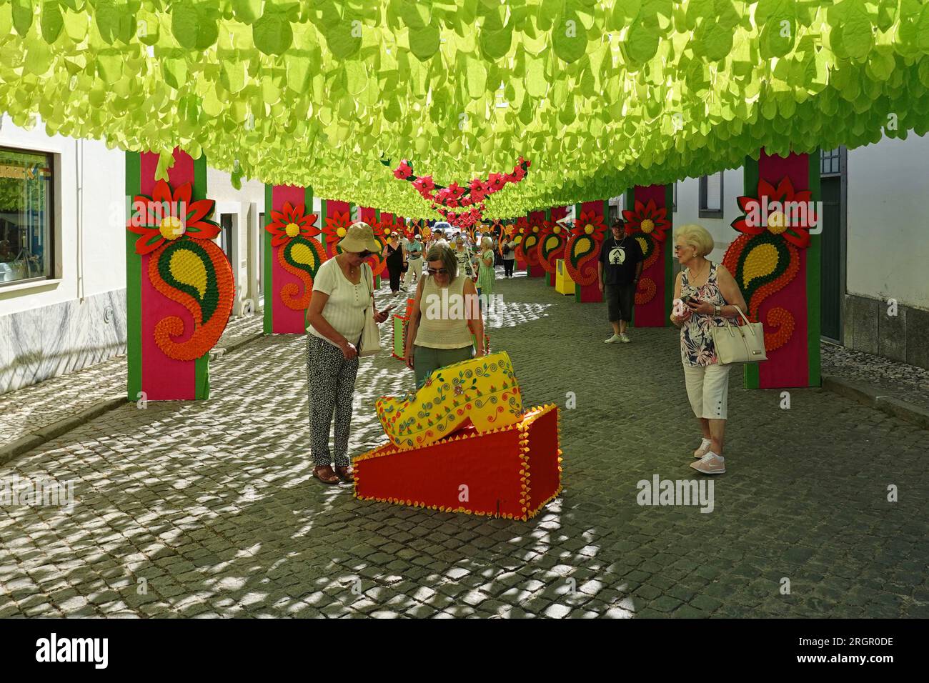 Ruas Floridas Flowered Streets festival with colourful paper flowers in ...