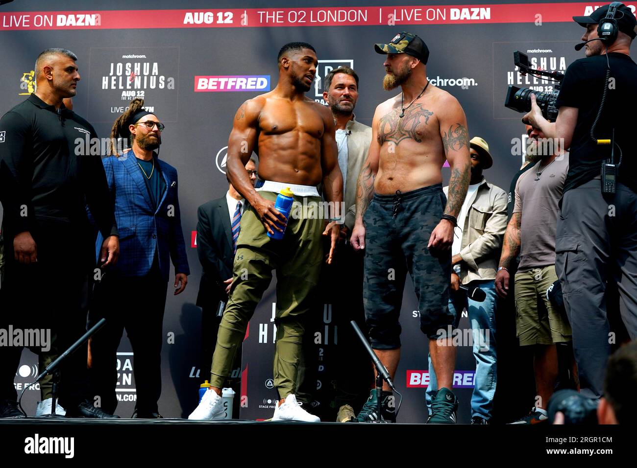 Matchroom Sport chairman and boxing promoter Eddie Hearn (centre ...