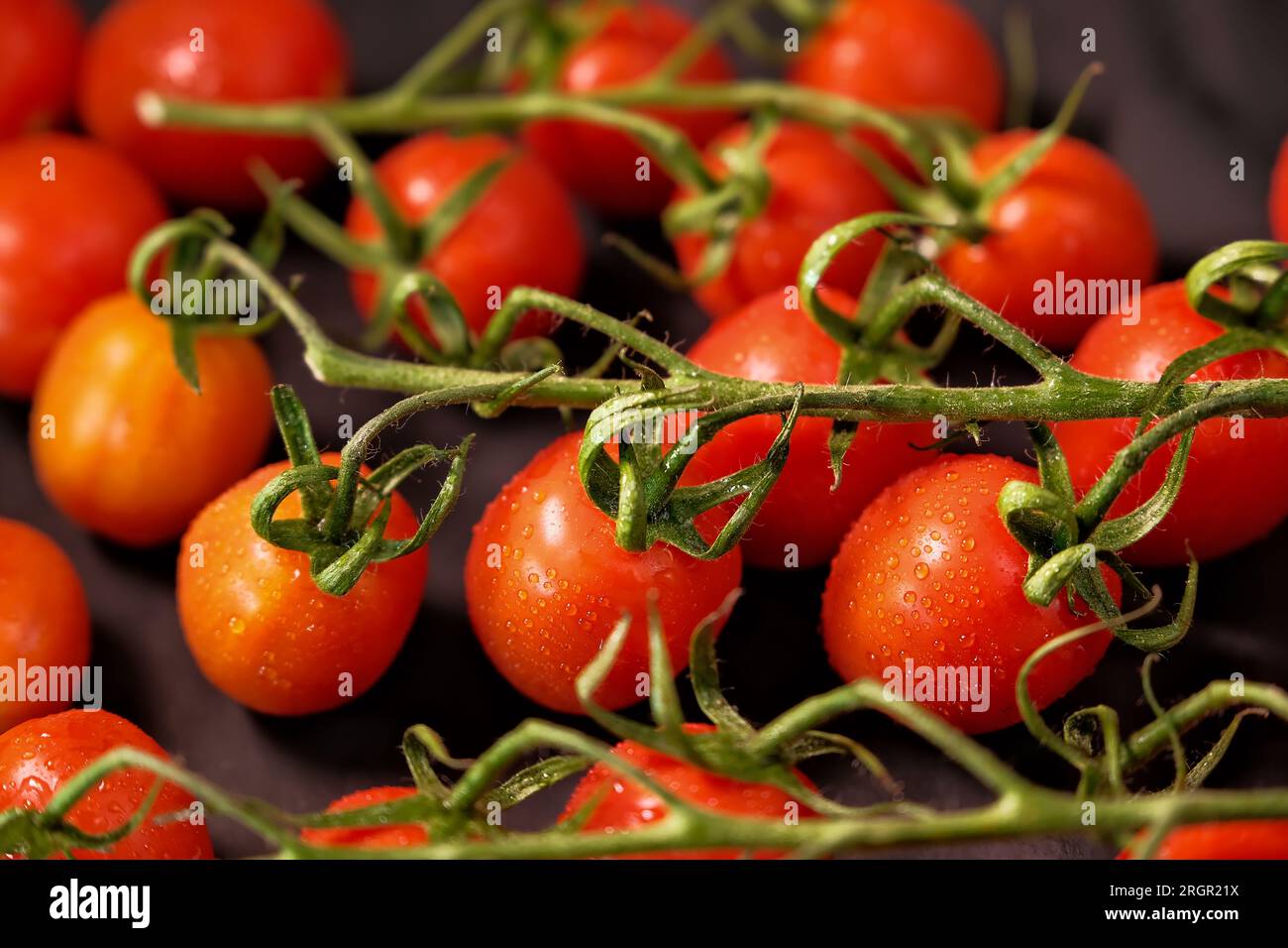 Drops on ripe tomatoes close hi-res stock photography and images - Alamy