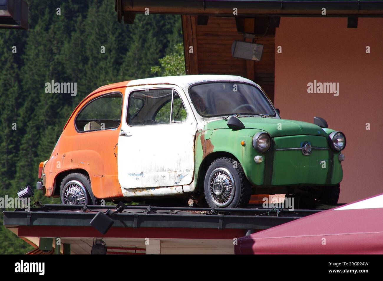 Rusty Old Orange, White and Green Fiat 500 Car on a roof Stock Photo ...