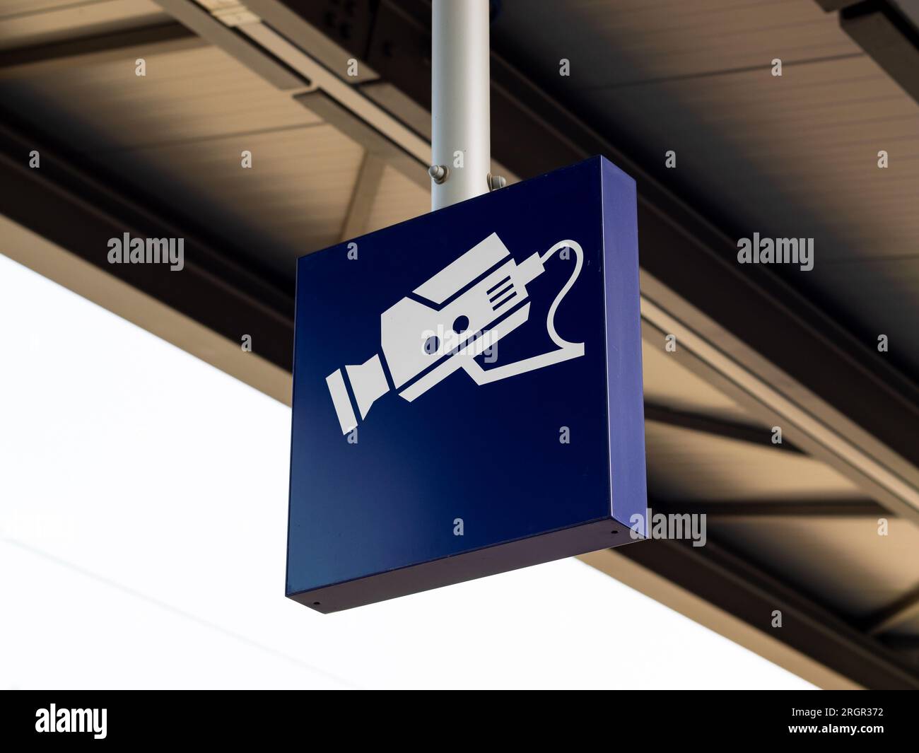 Public surveillance with video cameras sign at a train platform ...