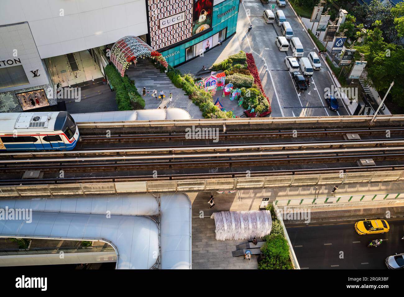 Trains coming and leaving Phrom Phong BTS sky train station with ...