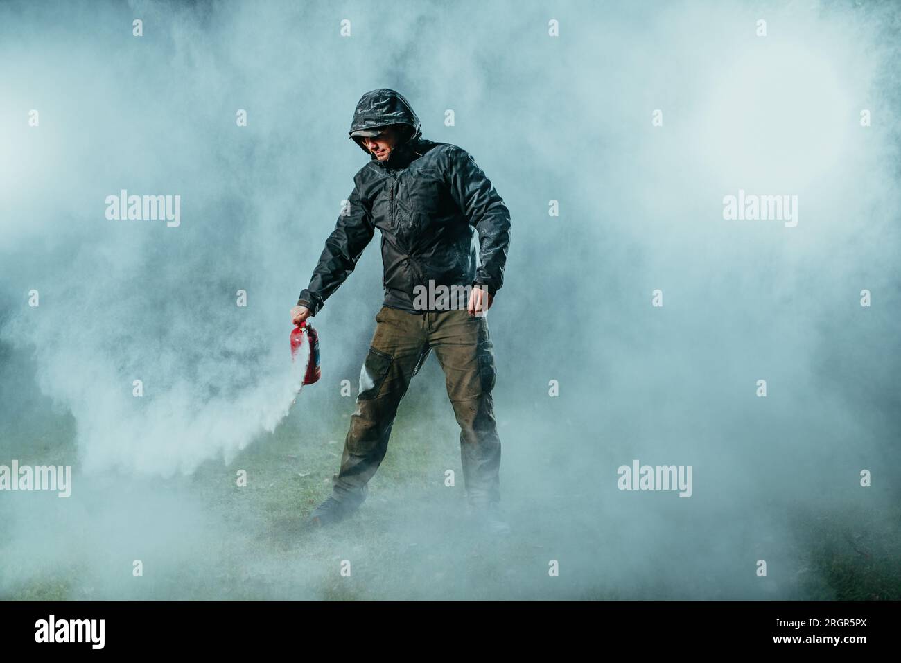 Man with fire extinguisher hi-res stock photography and images - Alamy
