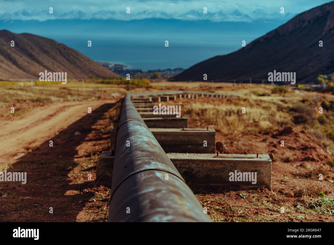 Long tube in mountains of Kyrgyzstan Stock Photo - Alamy