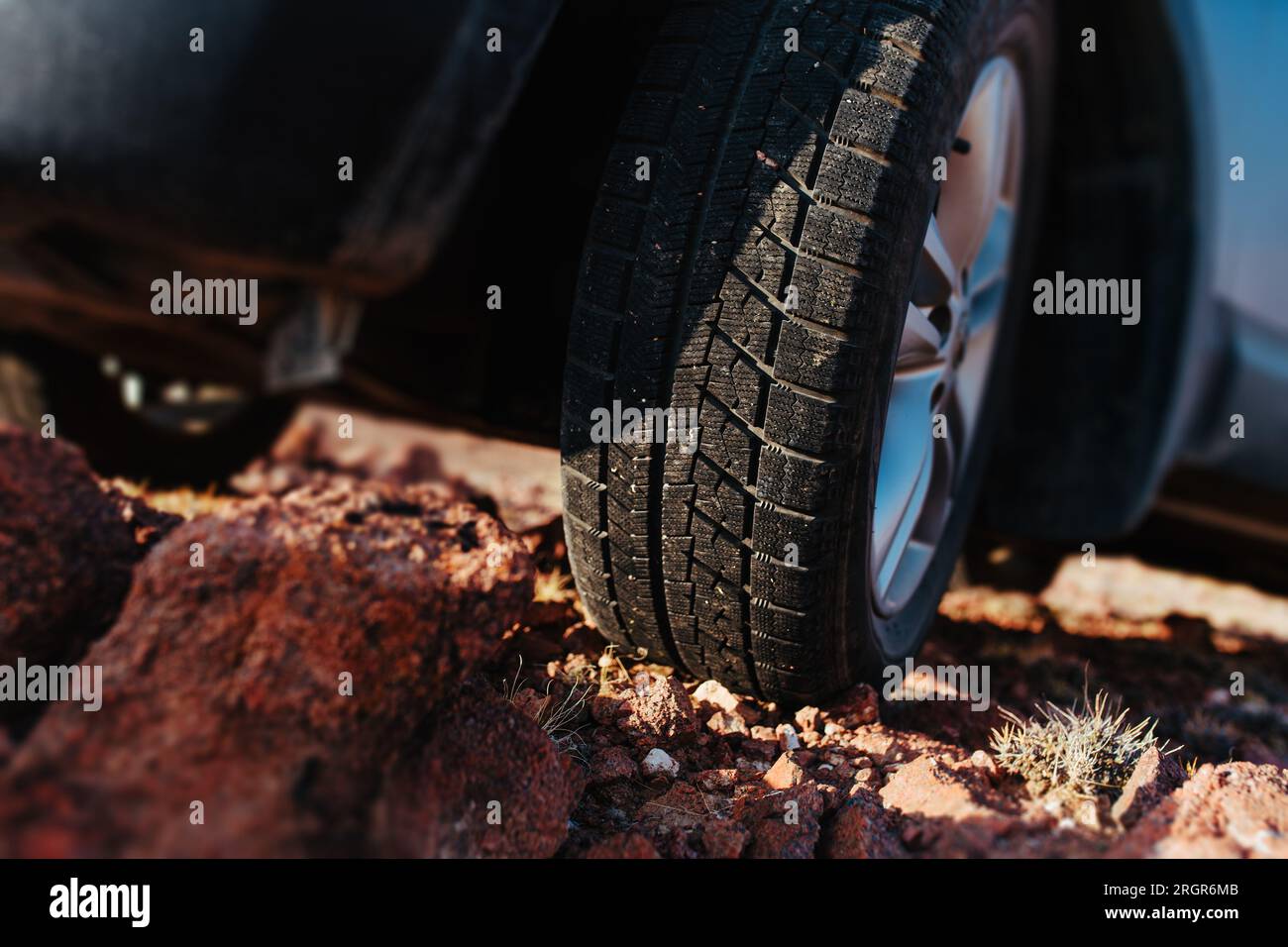 Car wheel on stones hi-res stock photography and images - Alamy