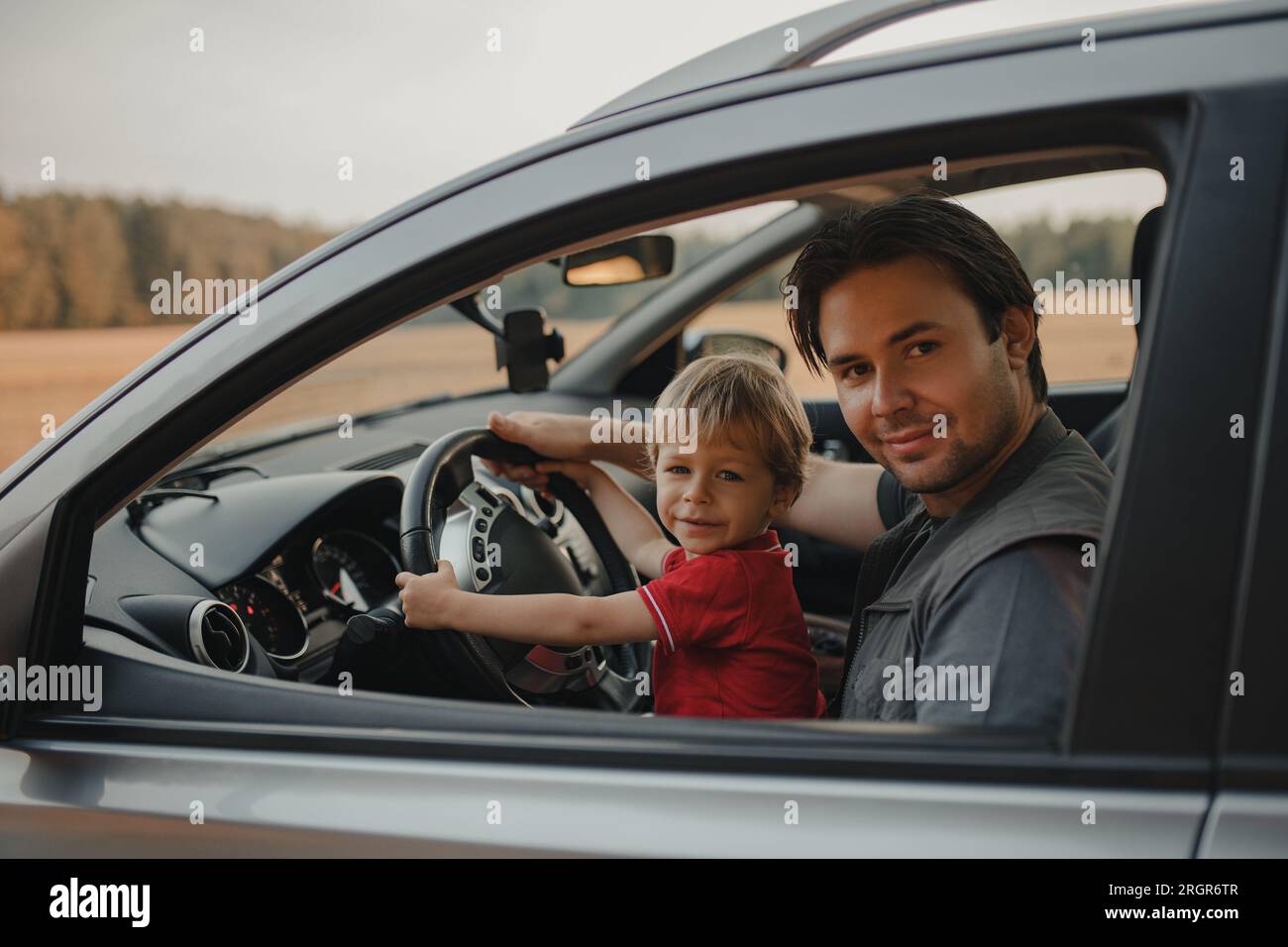 Father teaching son to drive hi-res stock photography and images - Alamy