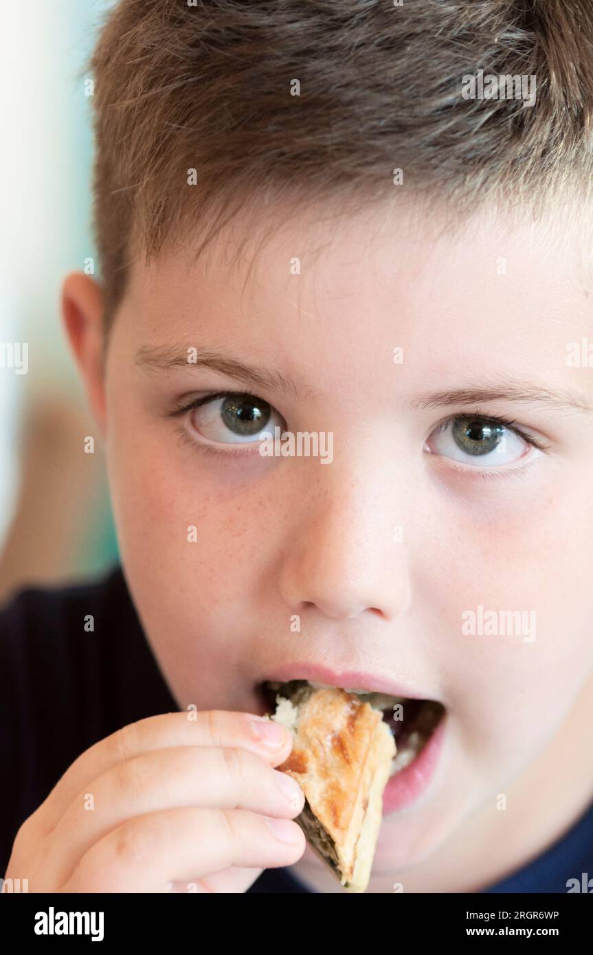 Boy eating pie hi-res stock photography and images - Alamy