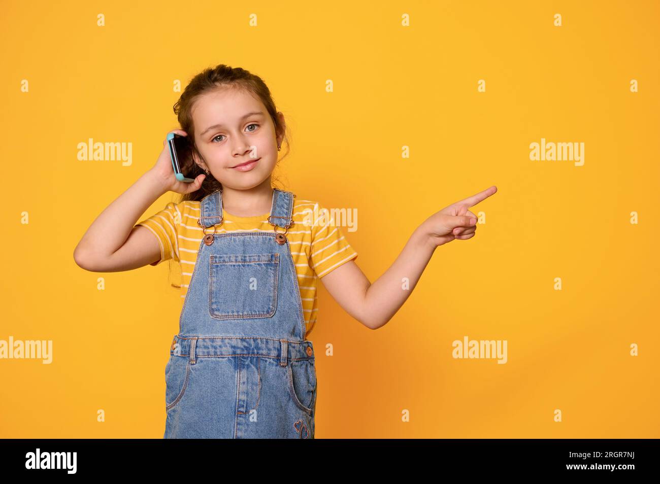 Caucasian charming kid girl 6 years old, a first grader, pupil, school ...