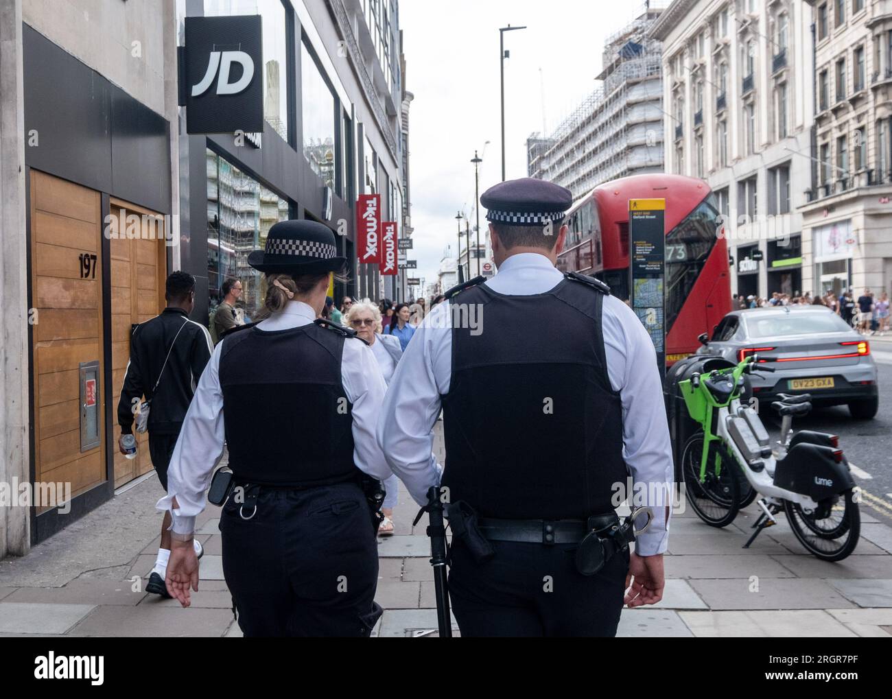 POLICE OXFORD STREET © Jeff Moore - Police officers walk past JD Sports ...