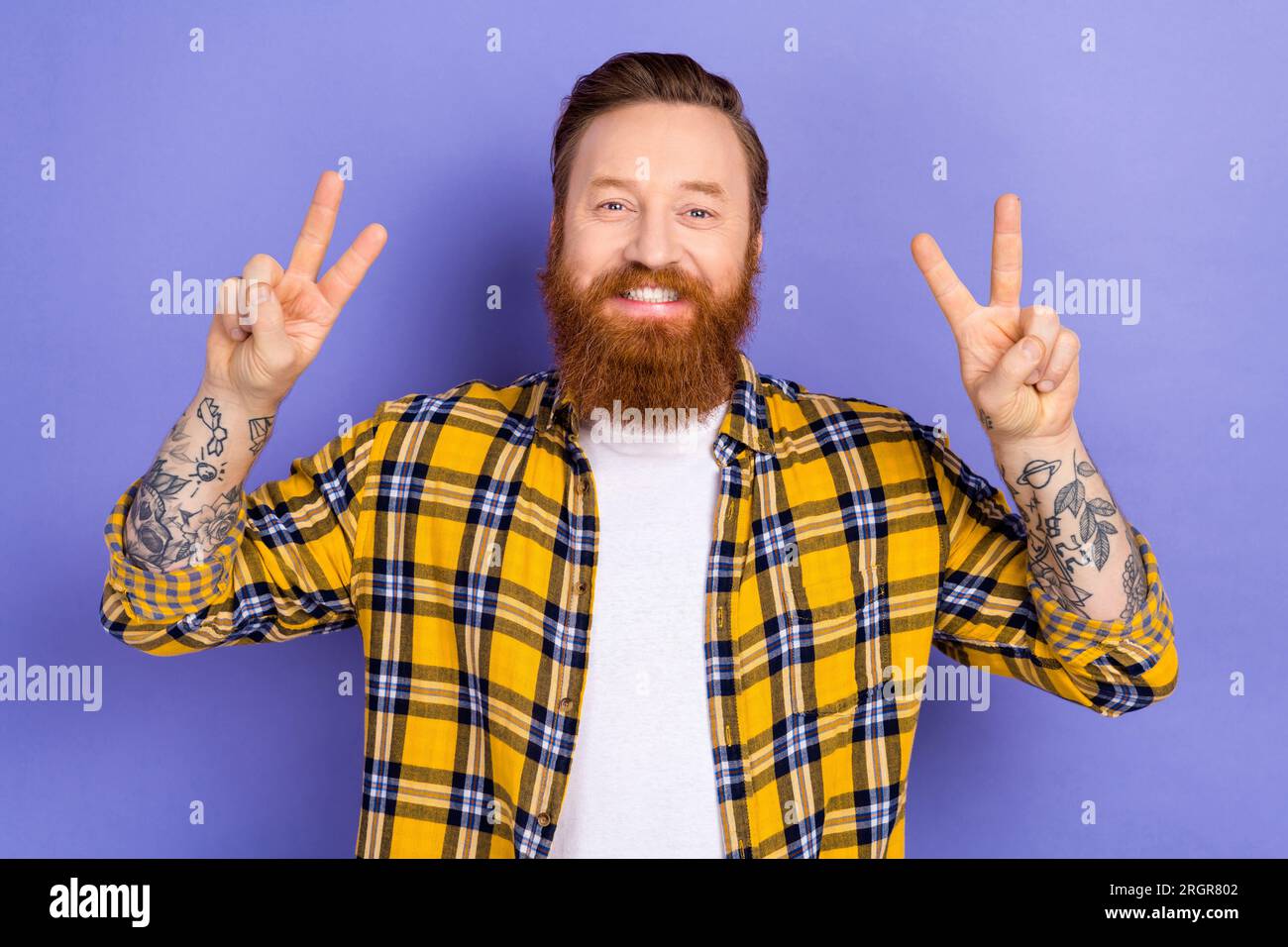 Photo of funny cheery guy overjoyed good mood showing v sign symbols ...