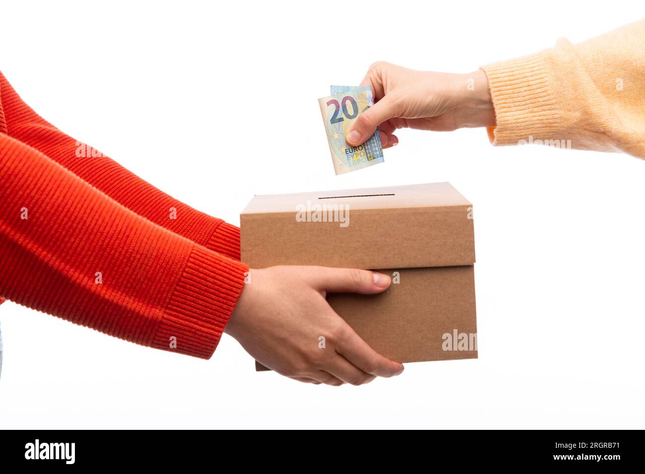 hand putting euro cash money into donation box Stock Photo - Alamy