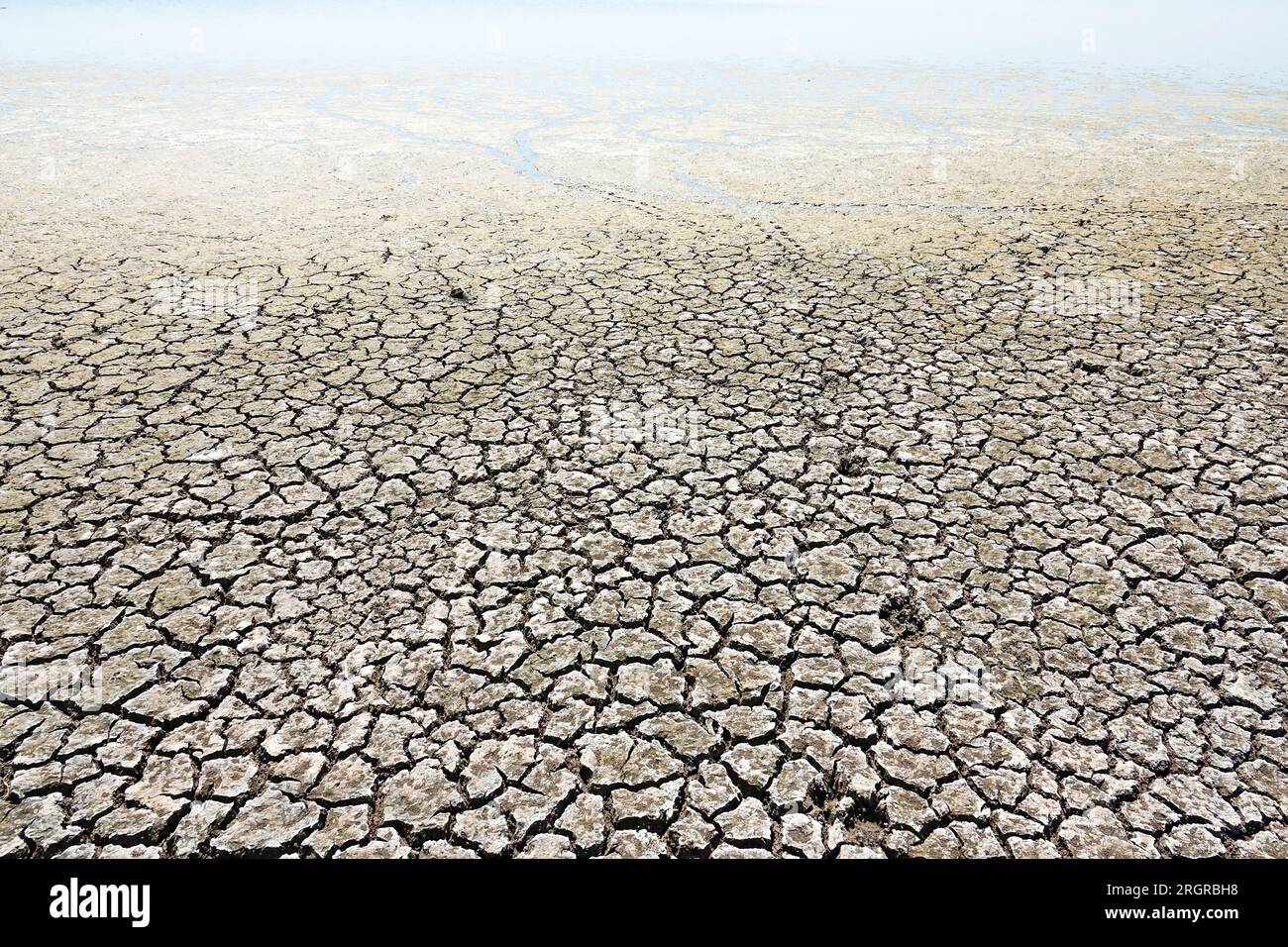 View of cracked-mud surface at Kabakli lake, whose waters are withdrawn ...