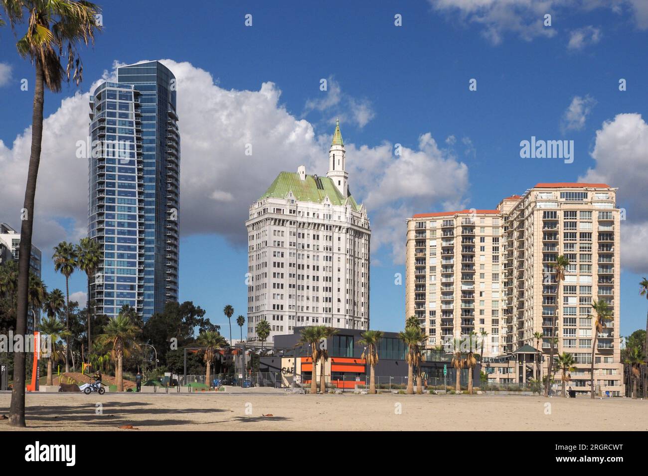 The long, wide beach in Long Beach on the Pacific Ocean is lined from ...