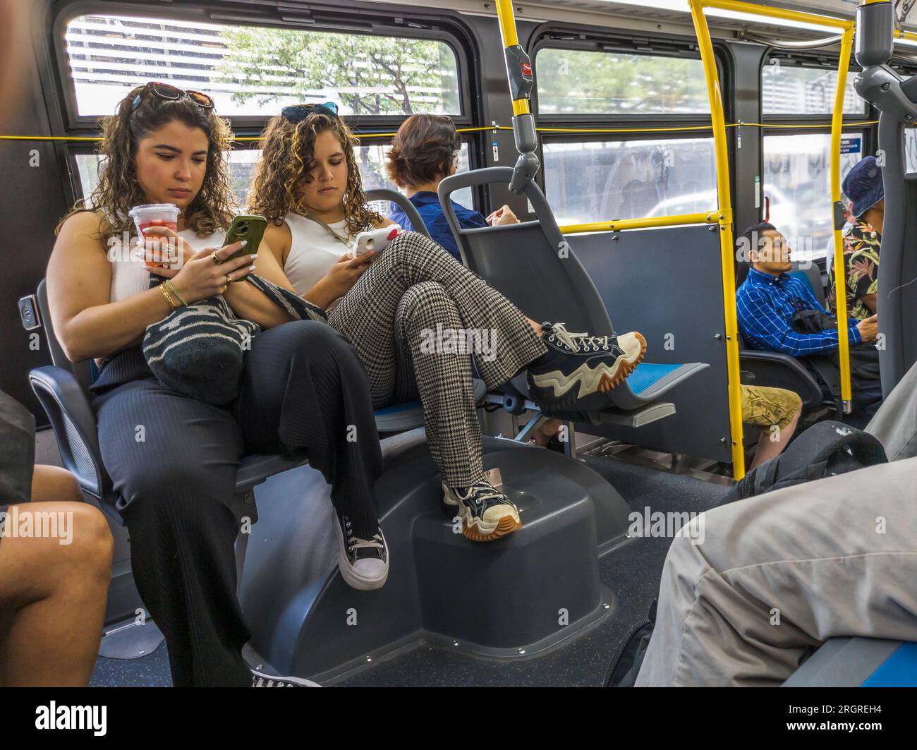 Passengers on an NYCTA M57 crosstown bus in New York on Saturday ...
