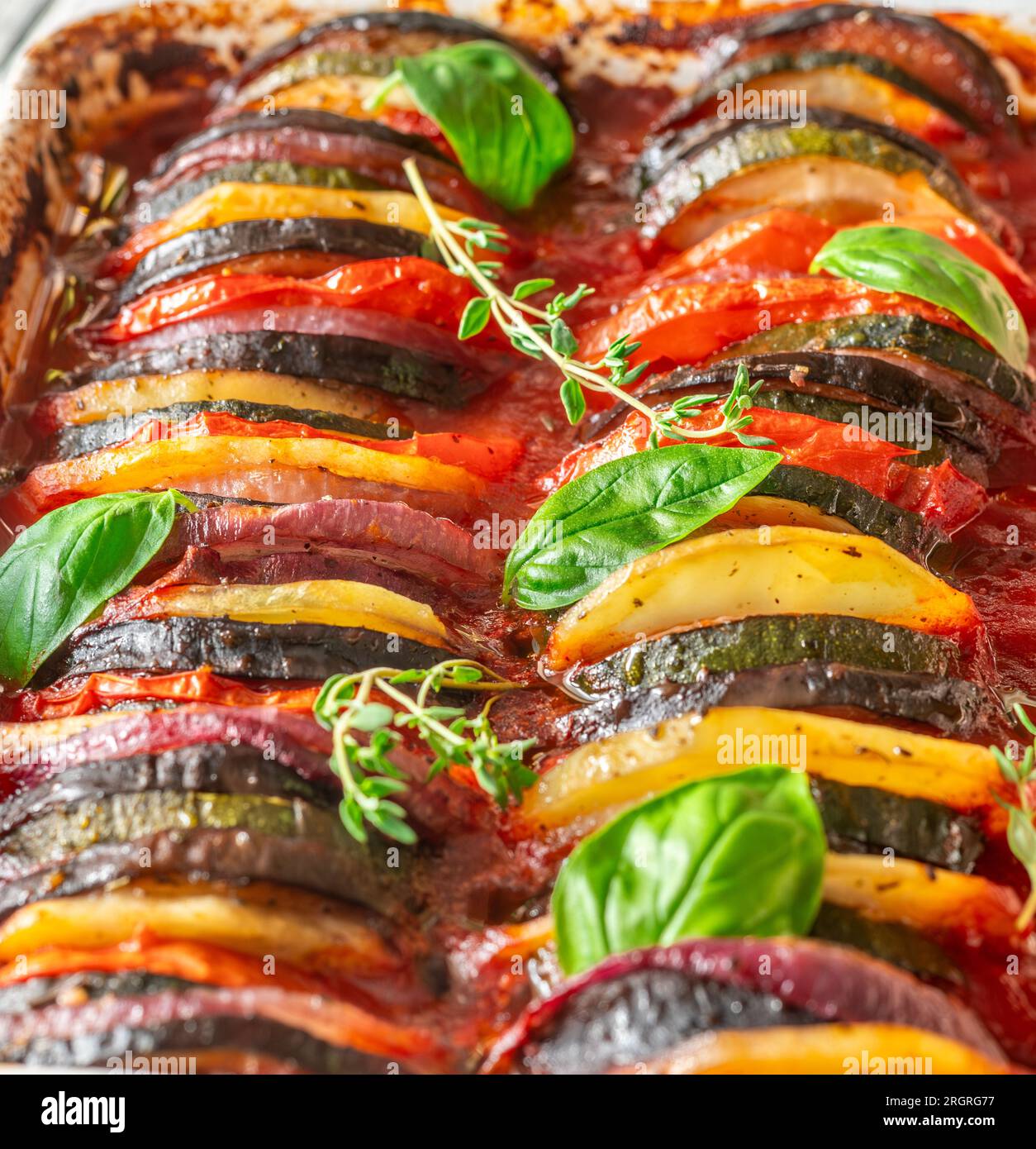 Baking dish with Briam Greek Vegetable Bake Stock Photo - Alamy