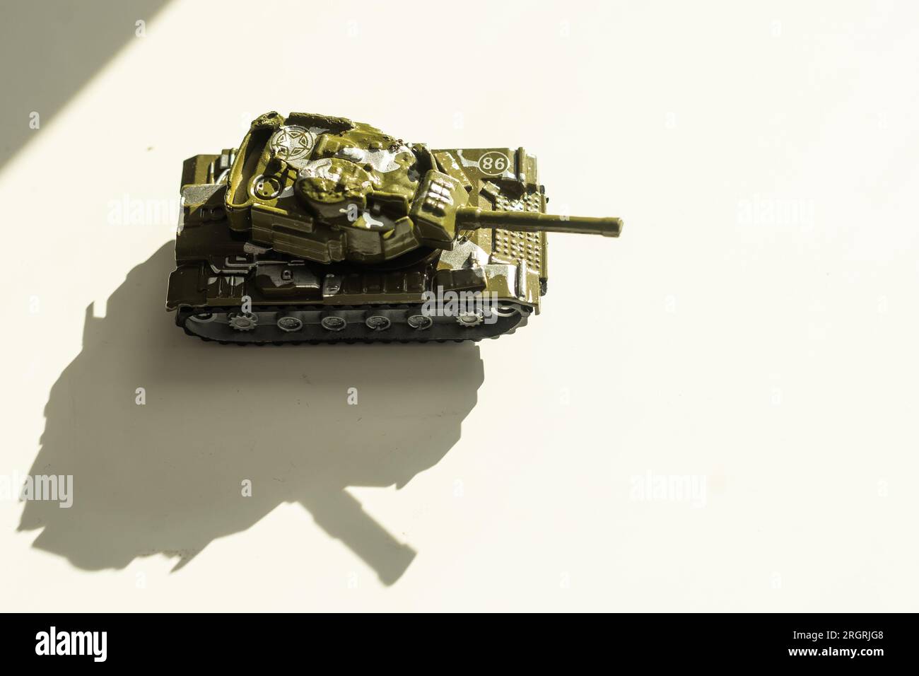 Model of the Soviet tank mini on a white background Stock Photo - Alamy