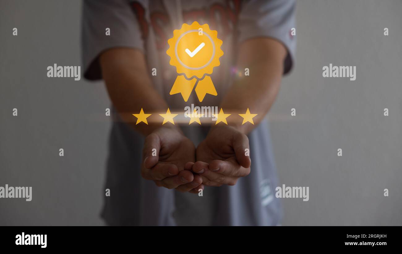 Hand shows the sign of the top service Quality assurance, Guarantee ...