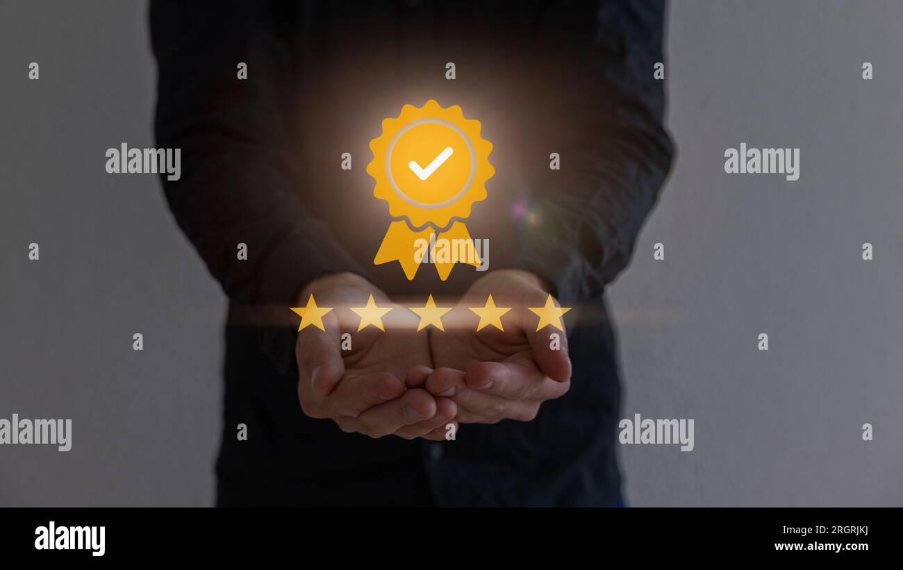 Hand shows the sign of the top service Quality assurance, Guarantee ...