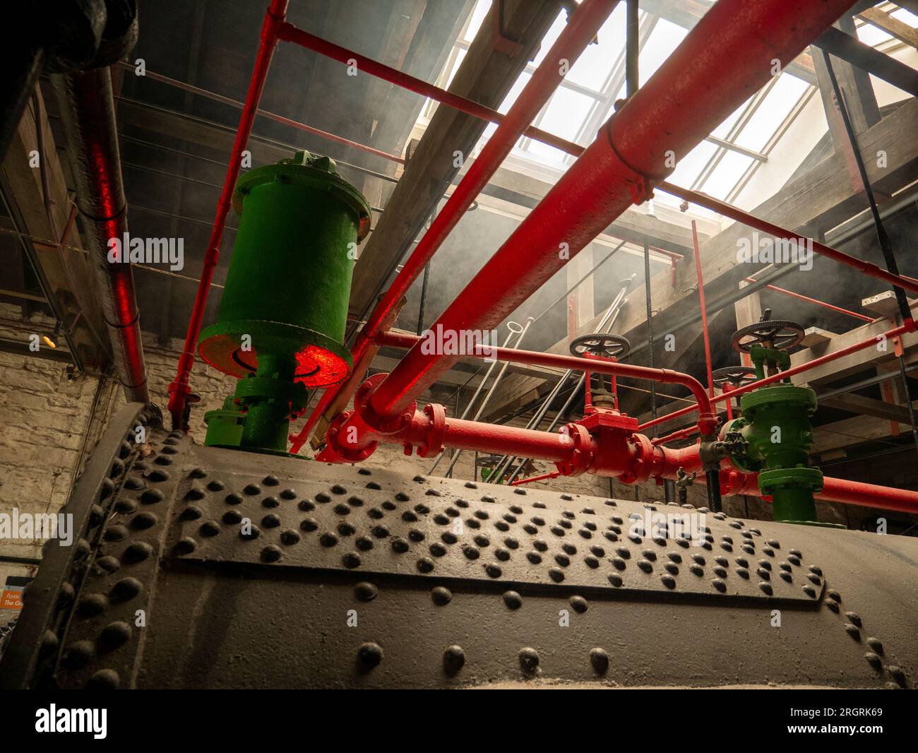 Industrial pipes background, power plant with steam engines and boilers ...