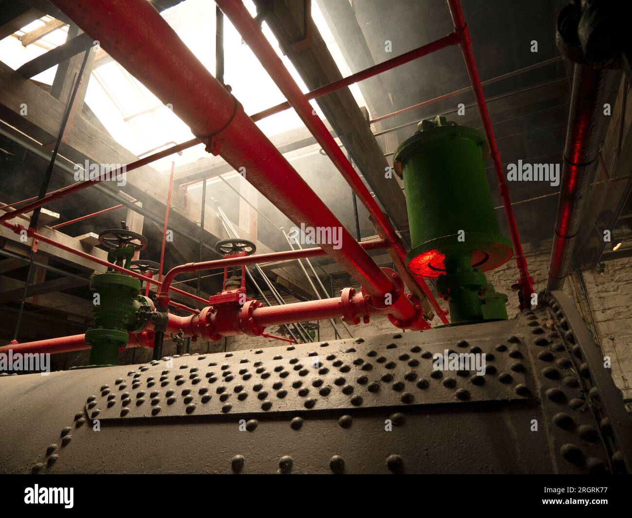 Industrial pipes at the power plant background, steam engines and ...
