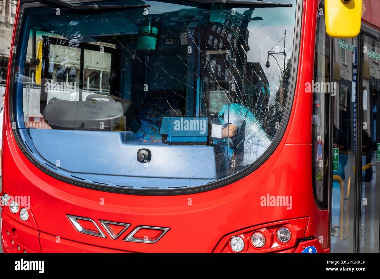 London, UK. 11 August 2023. A man adjusts the exterior signs of a ...