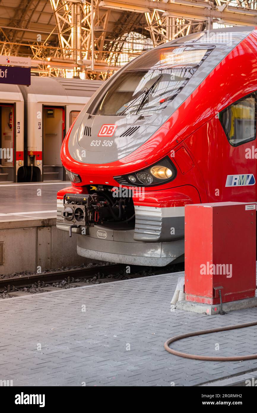 Red modern Deutsche Bahn train at the station. Beautiful train close-up ...