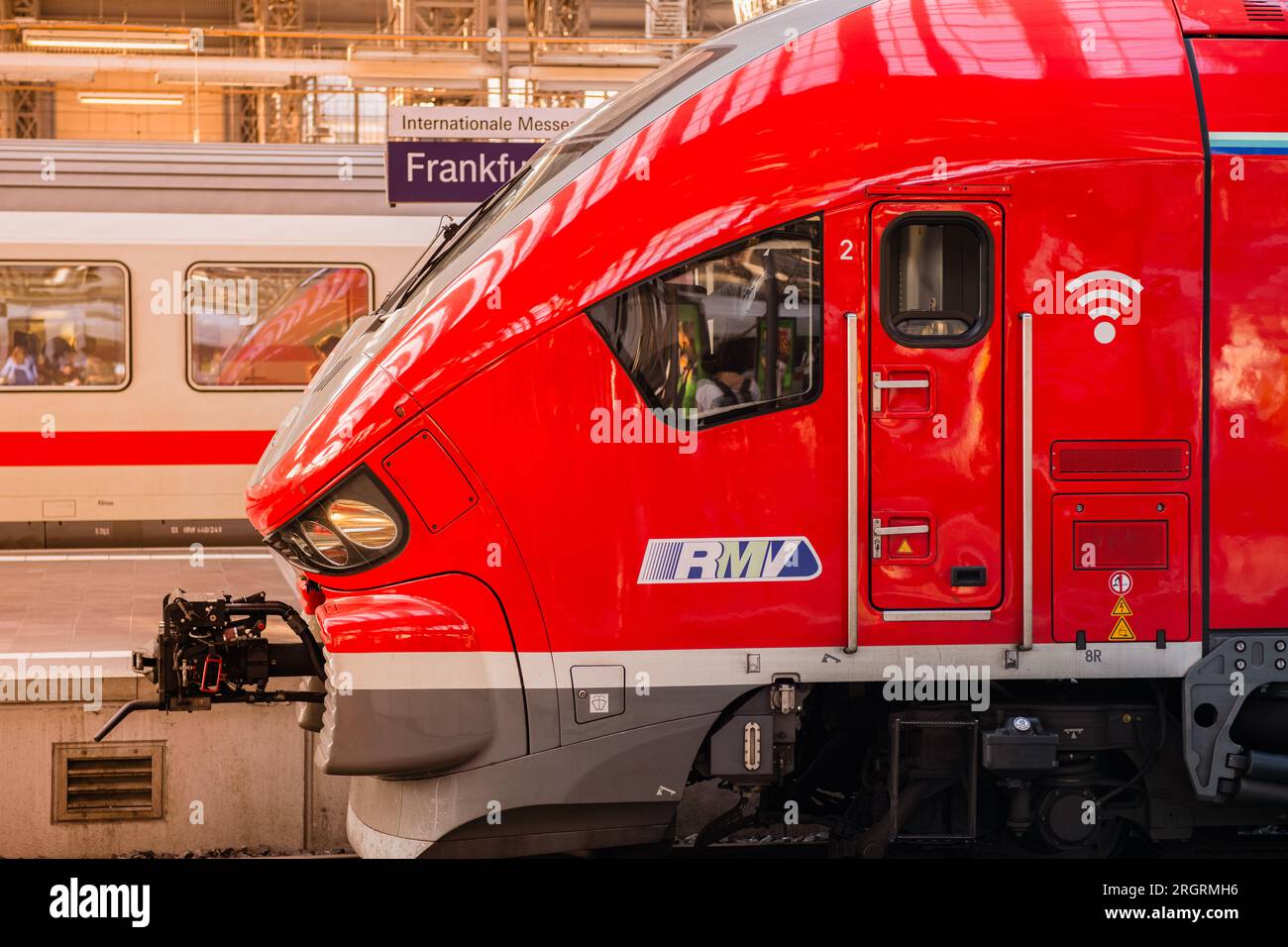 Red modern Deutsche Bahn train at the station. Beautiful train close-up ...