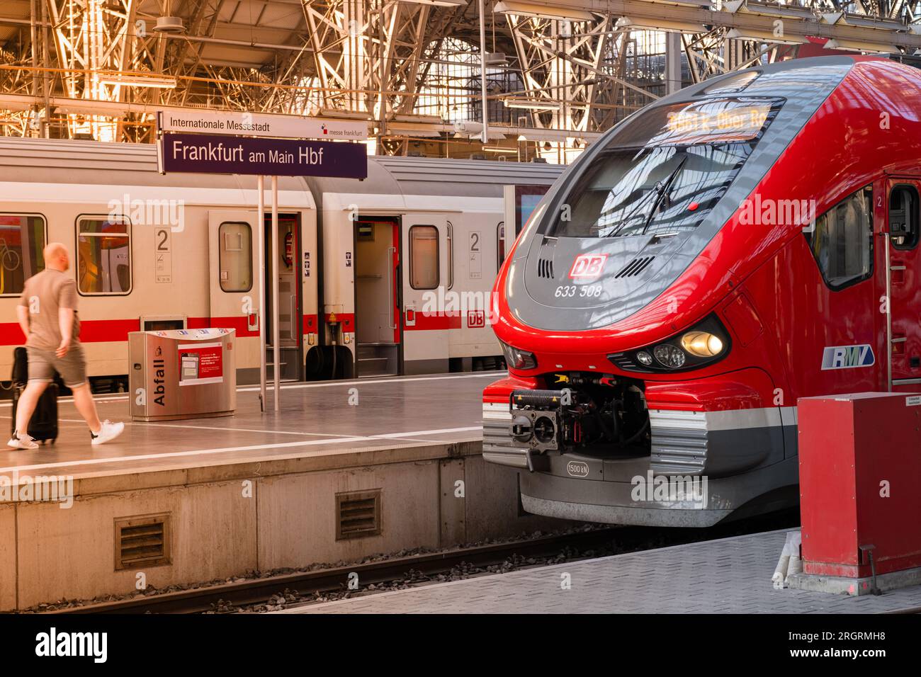 Red modern Deutsche Bahn train at the station. Beautiful train close-up ...