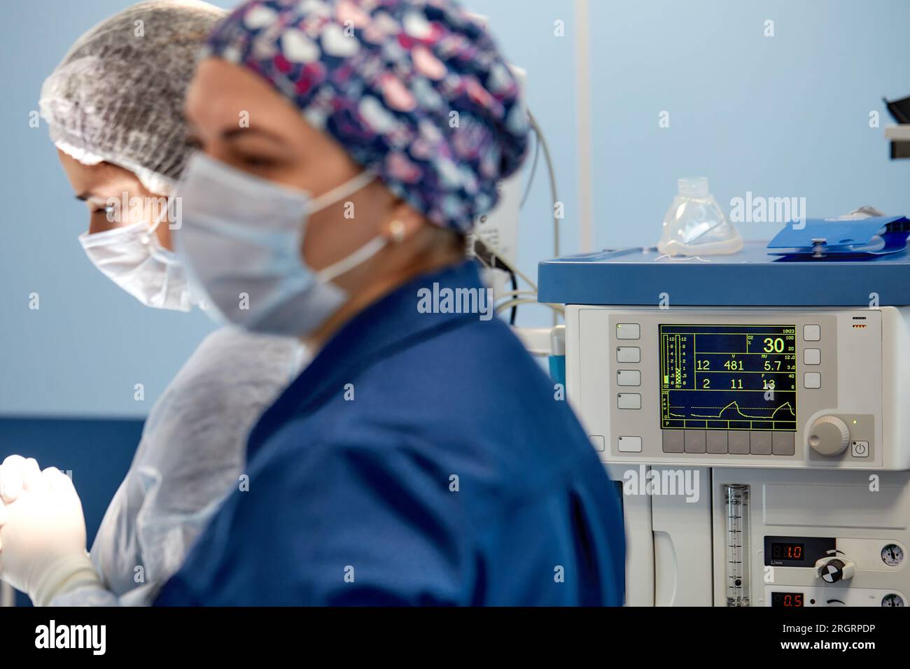 surgeon keeping track of vital functions of the body during cardiac ...