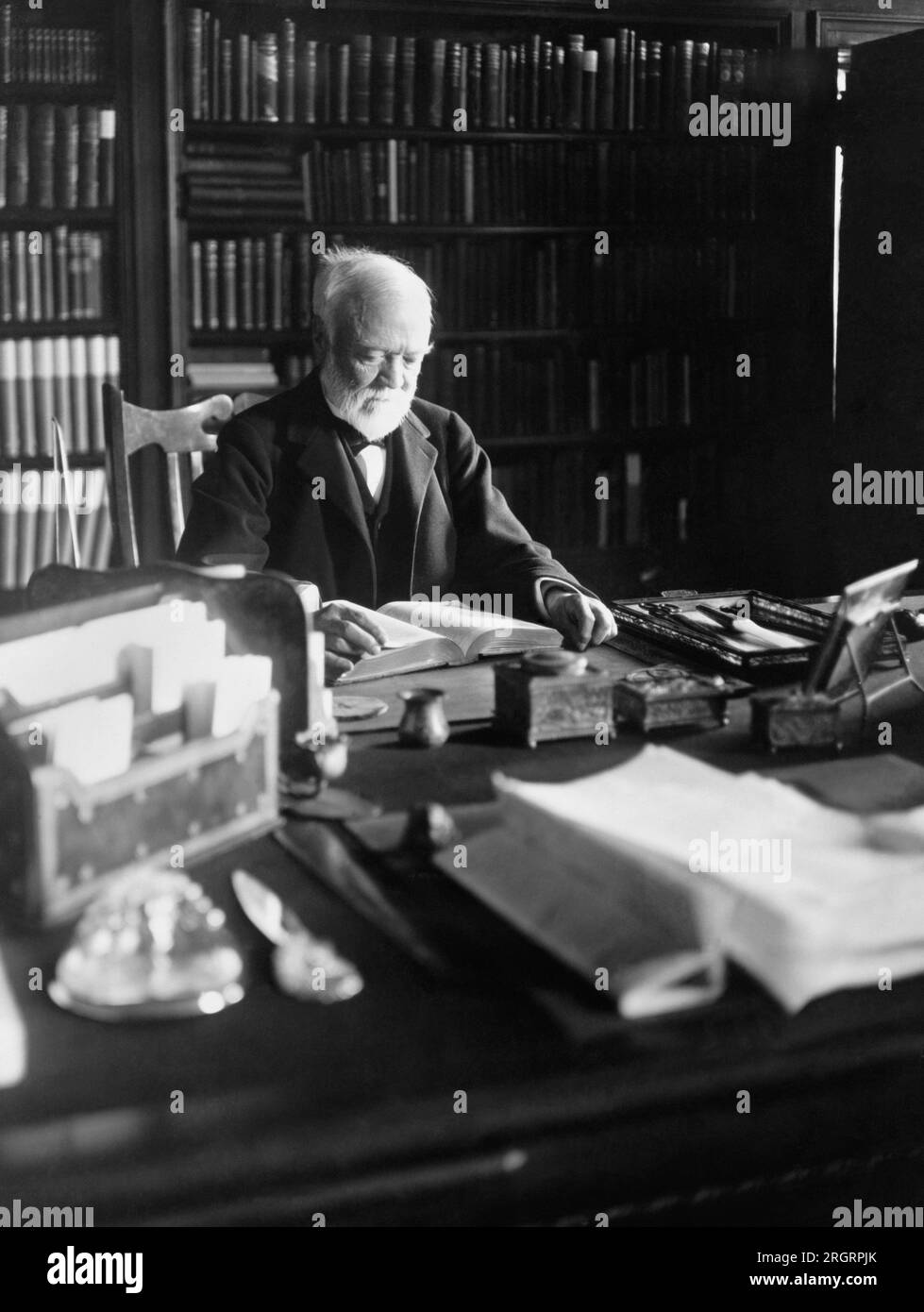 New York, New York: April 5, 1913 Andrew Carnegie reading a book at his ...
