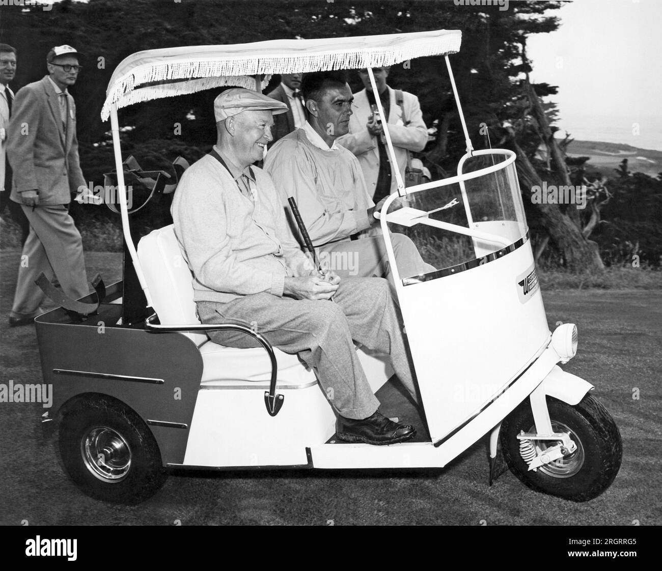Pebble Beach, California: 1956 President Eisenhower riding in a golf ...