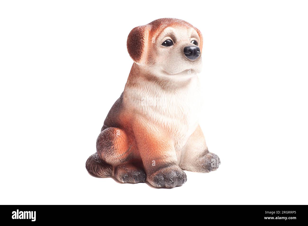 Rubber toy dog figurine isolated on white background Stock Photo - Alamy