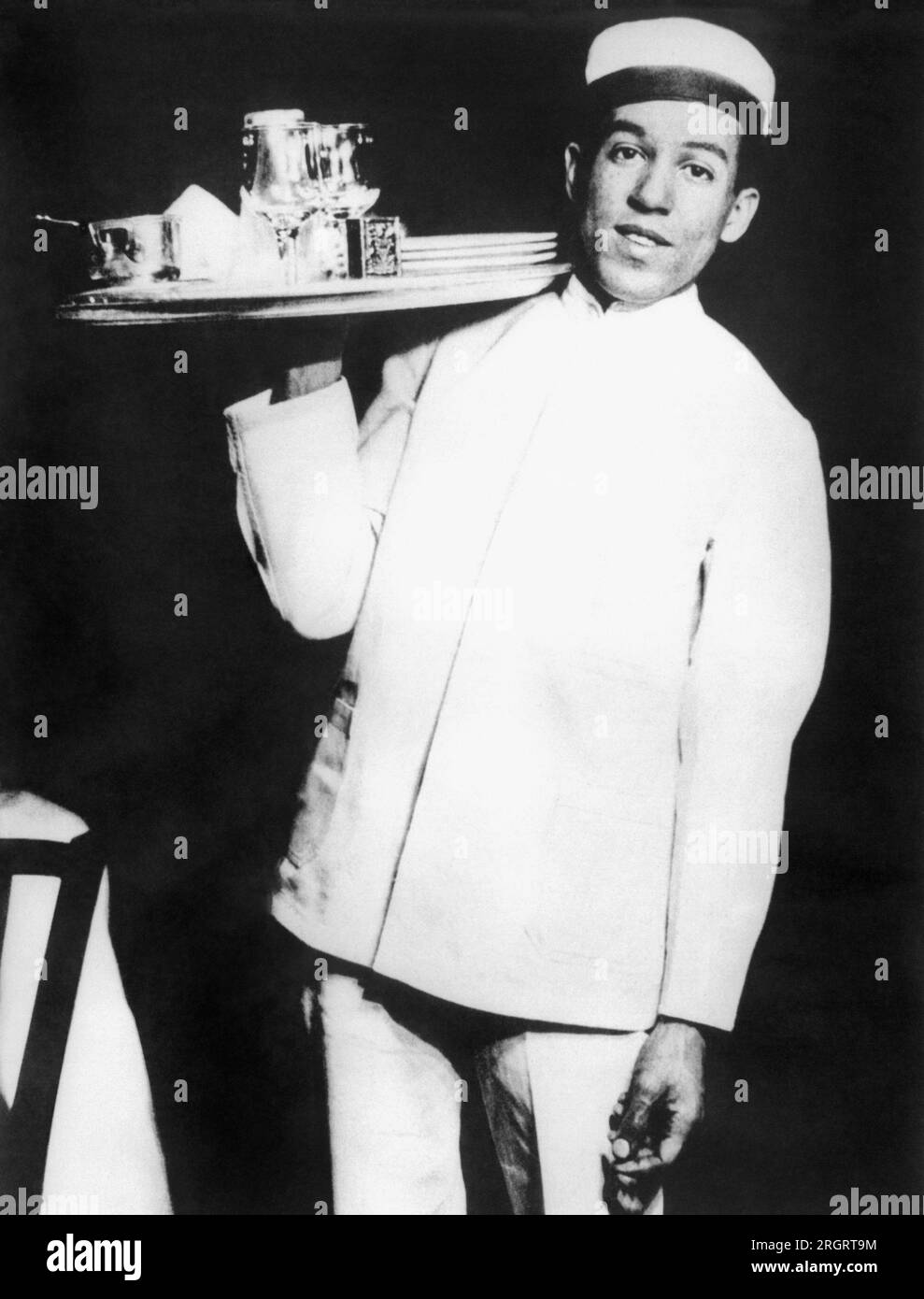 Restaurant busboy Black and White Stock Photos & Images - Alamy