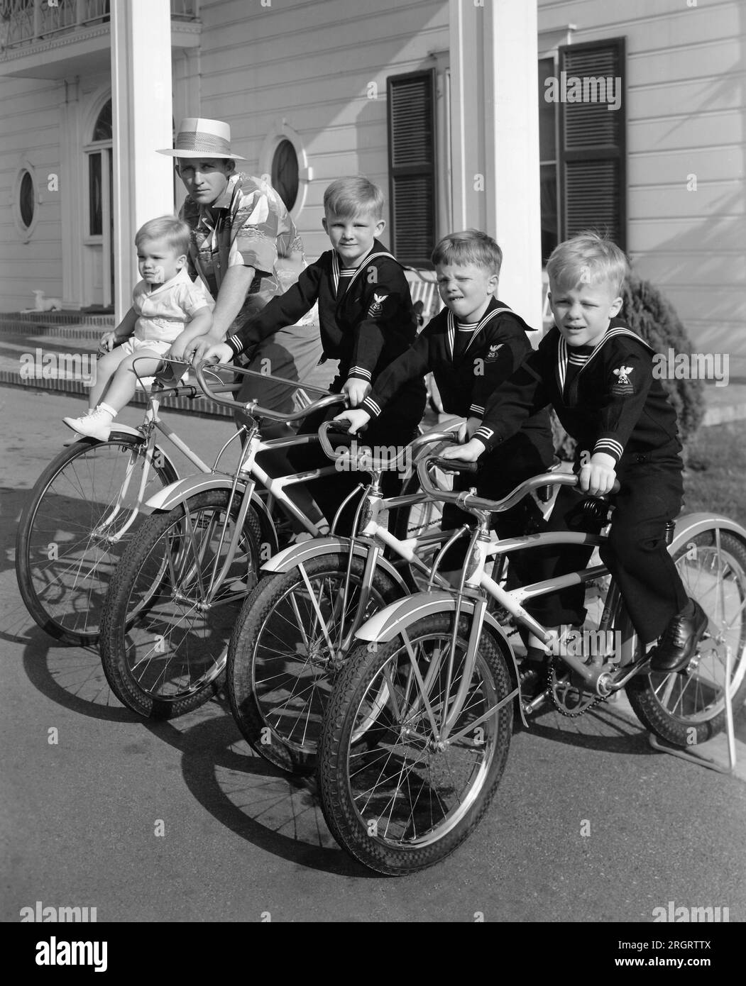 California: 1940 Bing Crosby and his four sons ready for a bicycle ride ...