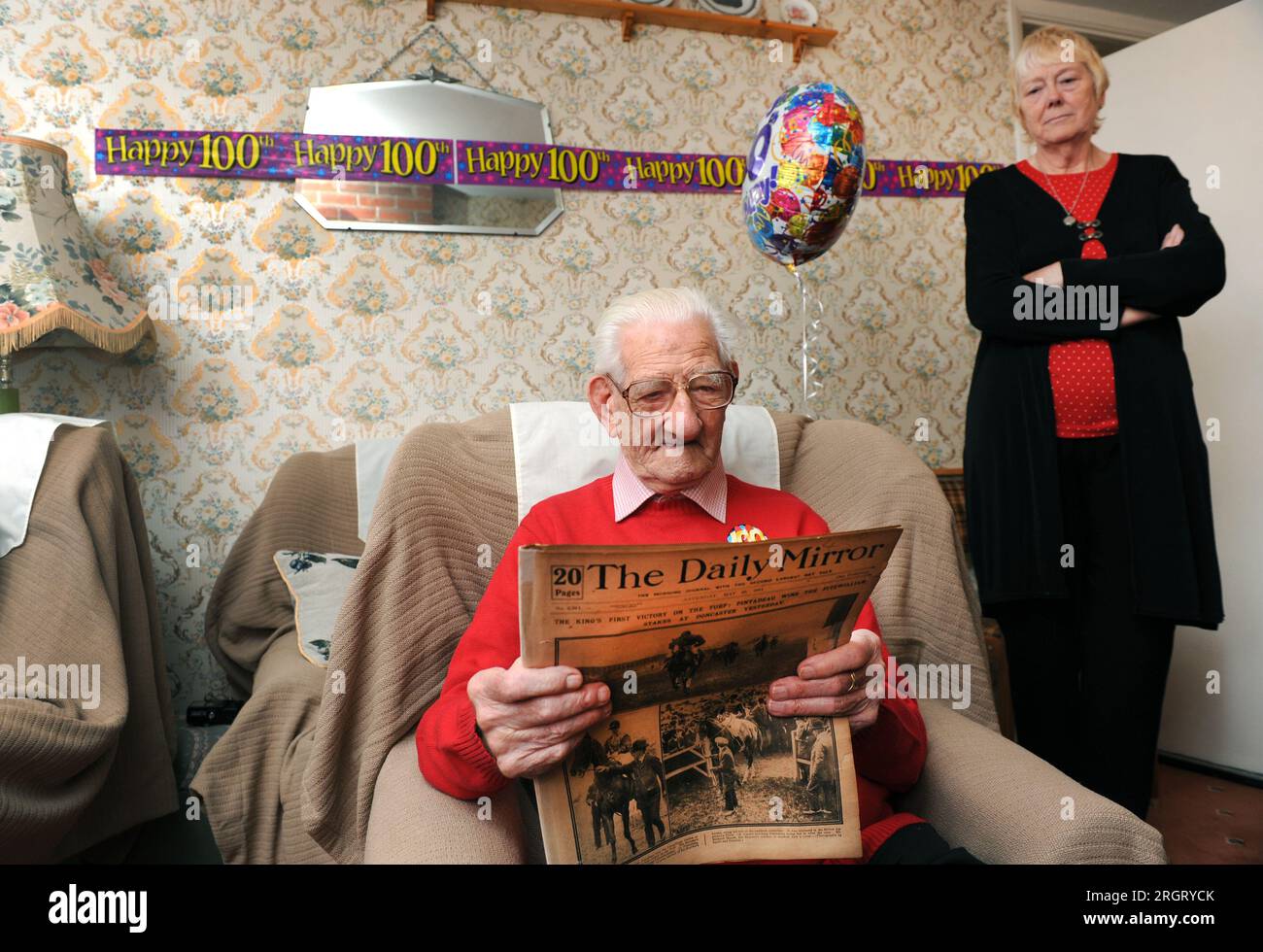 Bernard Rogers celebrates his 100th birthday reading a copy of the ...
