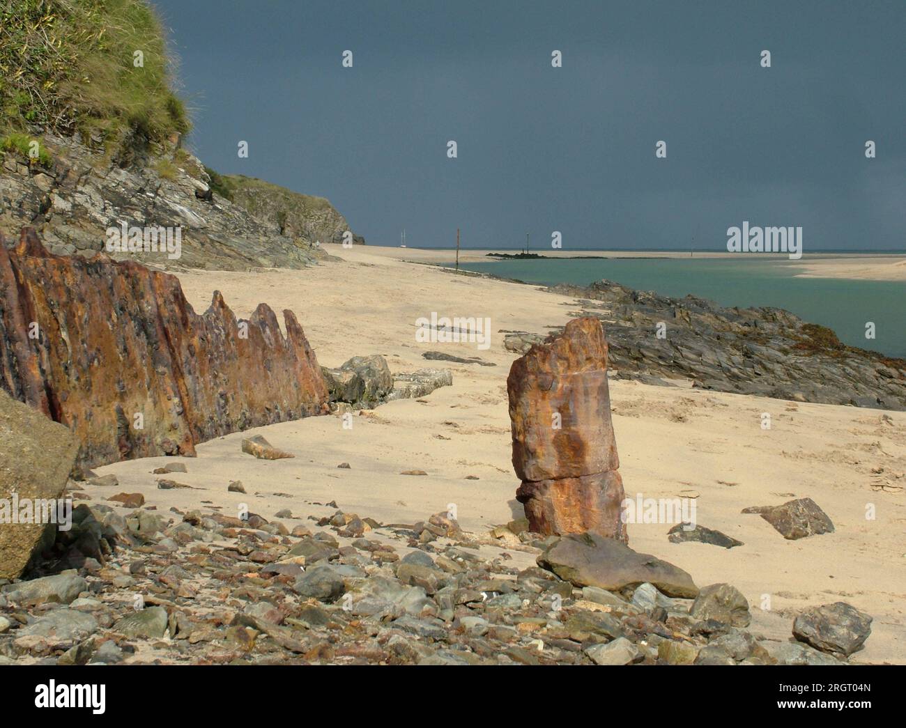 Autumn sunshine on the cliffs, beach , rocks and colours created by the ...