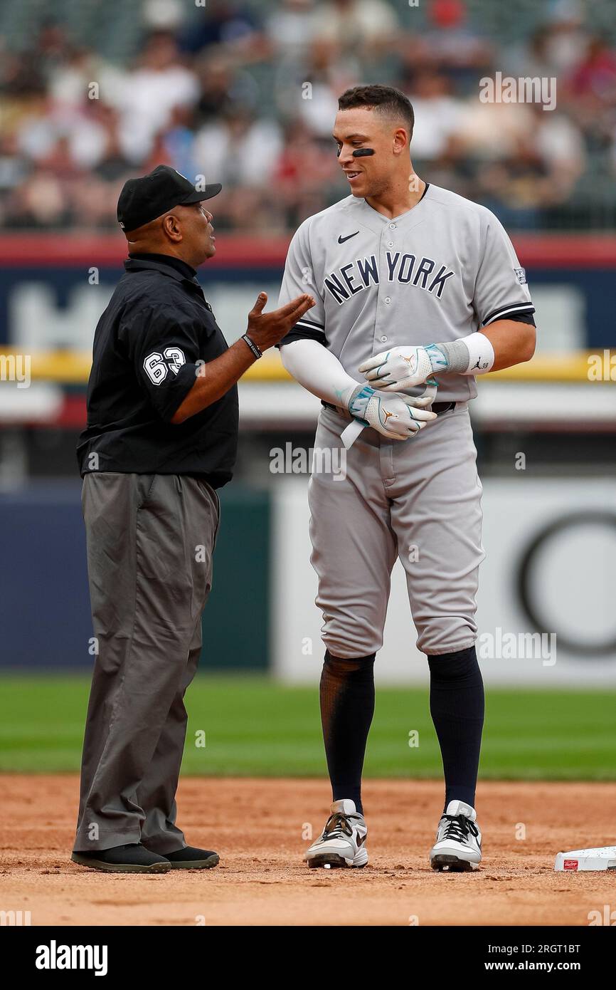 New York Yankees right fielder Aaron Judge (99) talks with MLB umpire ...