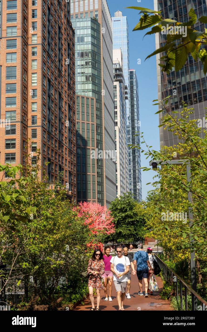 The old tree is a pink and red 25 foot tall sculpture comprised of man ...